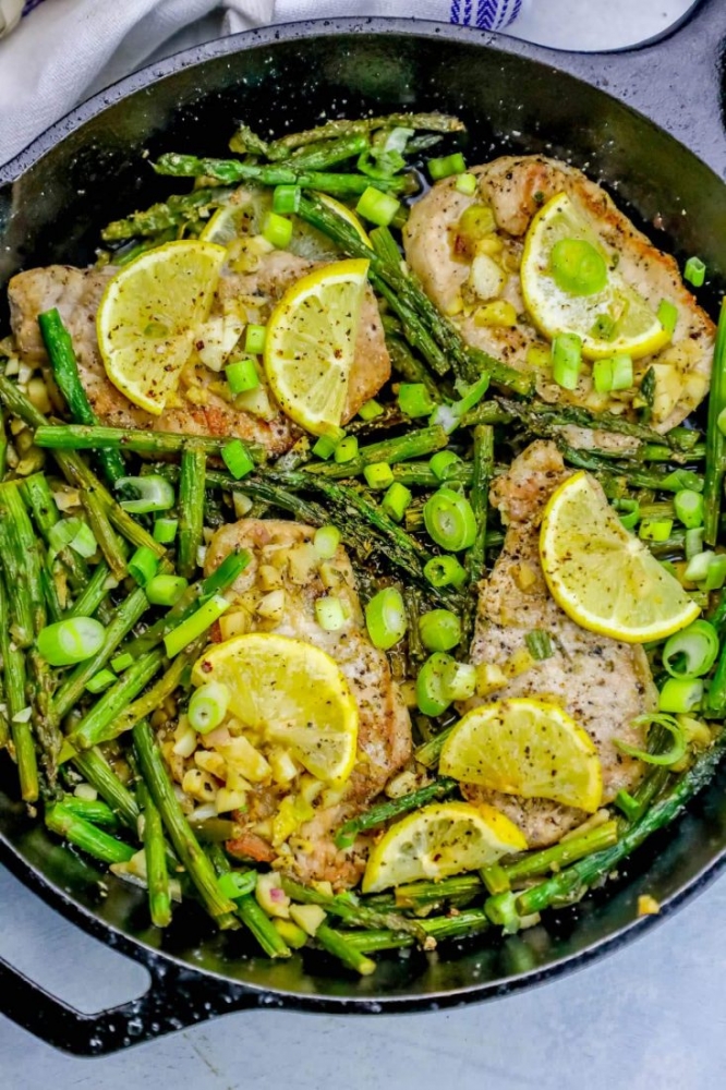 one pot lemon garlic pork chops and asparagus skillet meal