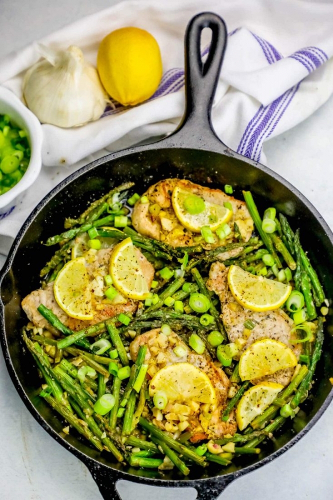 one pot lemon garlic pork chops and asparagus skillet meal